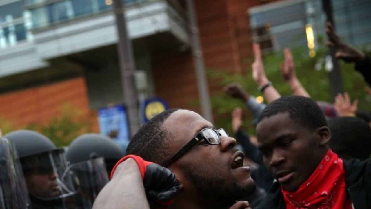 More than 1,000 march in Baltimore to protest black man's death