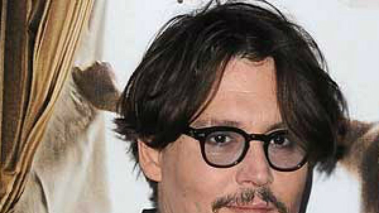 Actor Johnny Depp's pet dogs could land him in jail