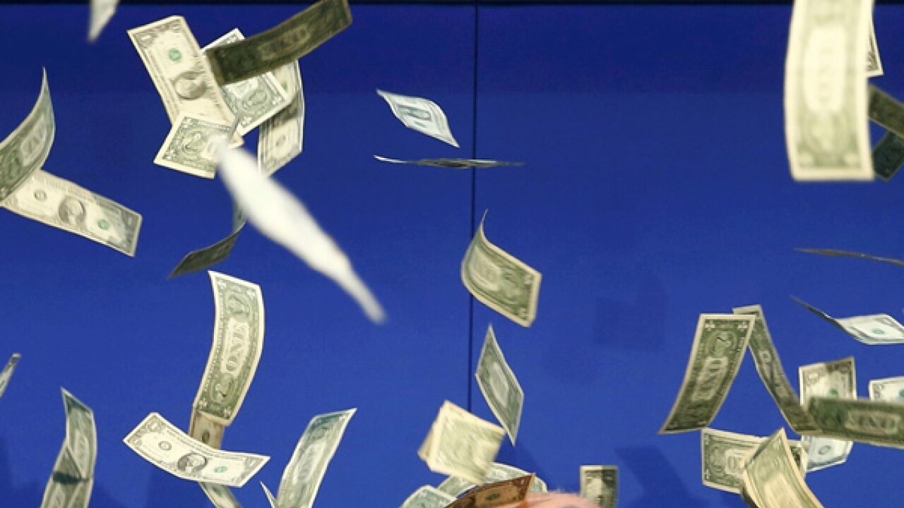 Prankster showers Sepp Blatter with fake money at FIFA HQ