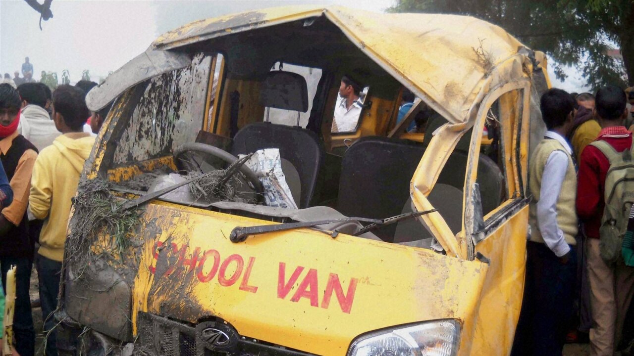 Two school children killed and four injured after train engine hits van