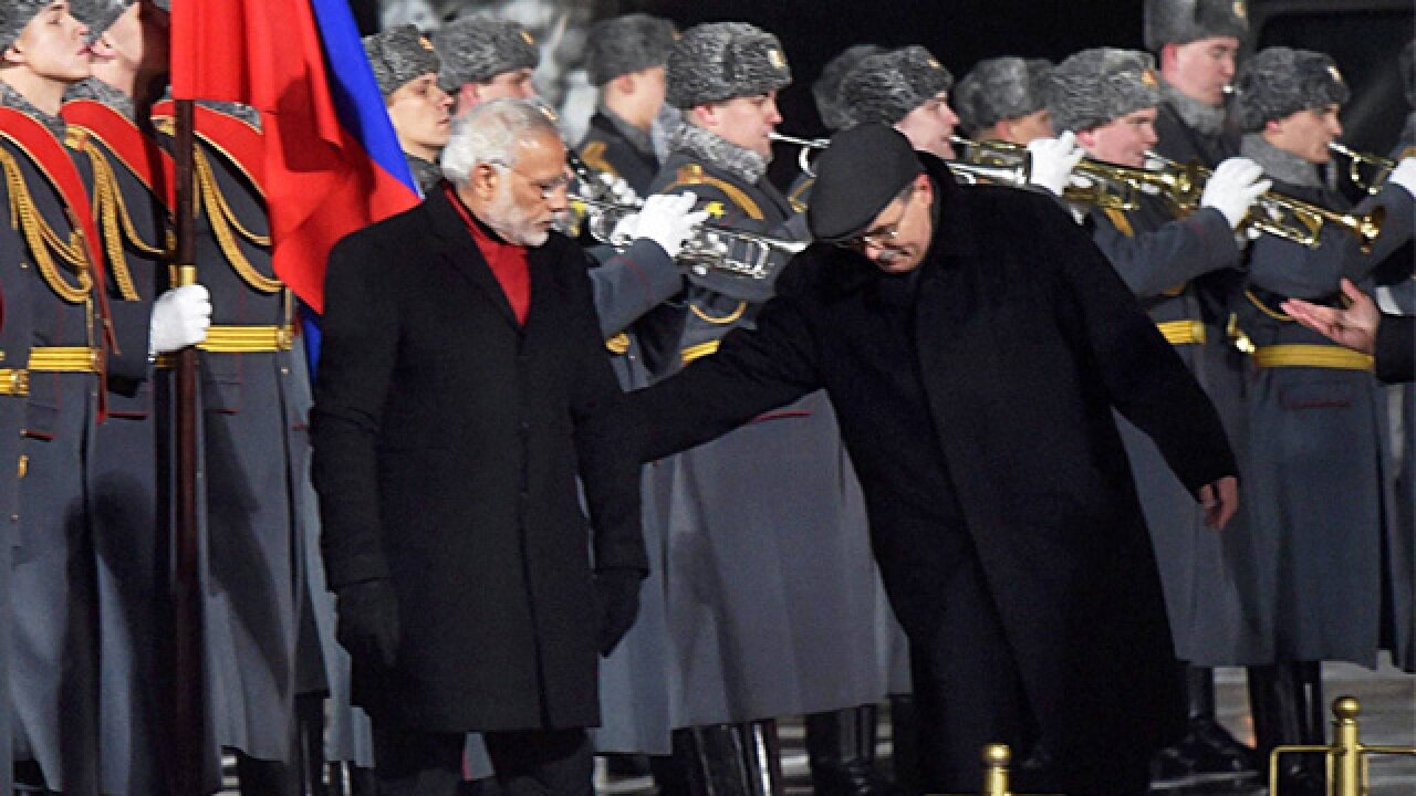 PM Narendra Modi walks during national anthem upon his arrival in Moscow