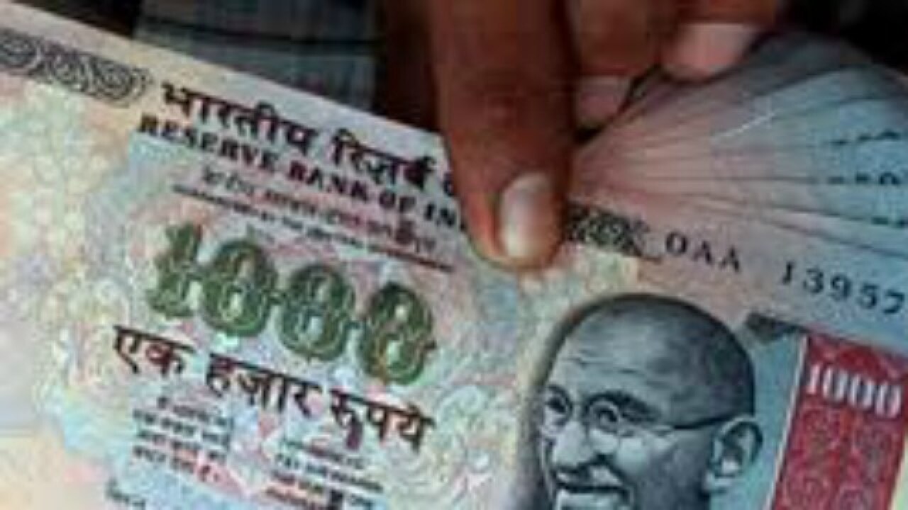 Rupee up 15 paise at 66.46 against US dollar