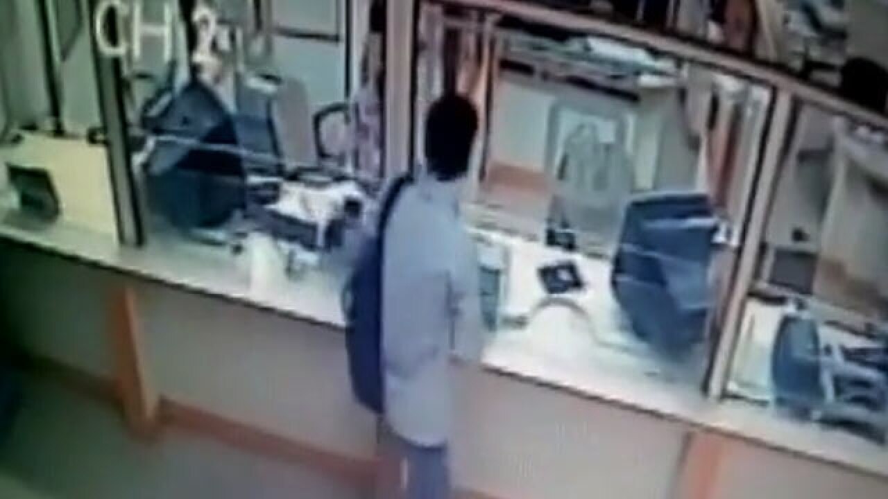 Watch: Two persons loot cash from bank using 'fake' pistol in Bhopal
