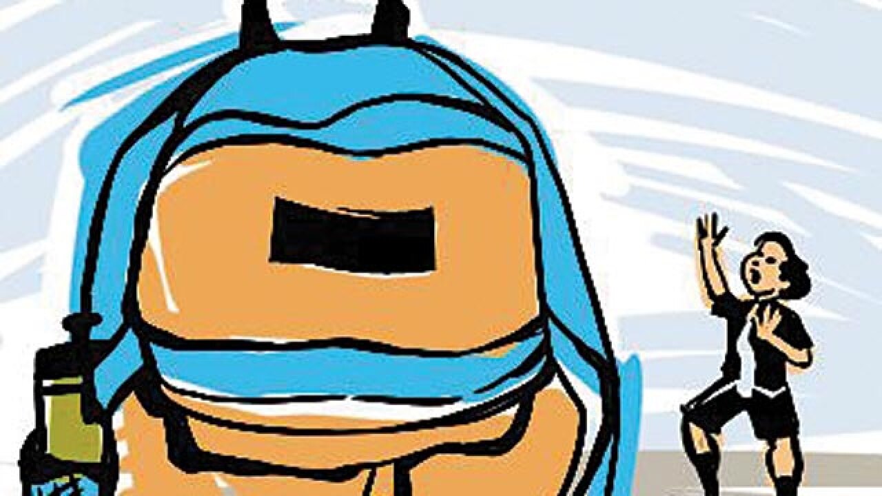 Kid falls off balcony due to heavy school bag