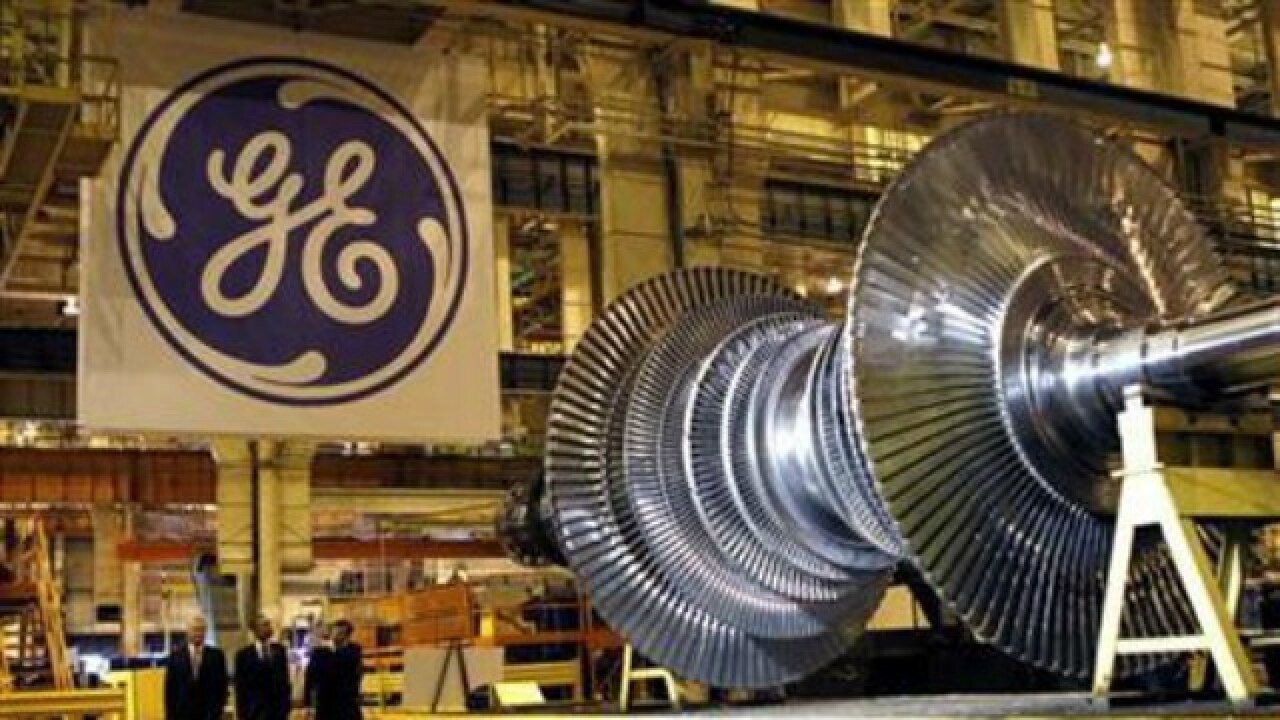 Nearly 2,500 General Electric workers stage protest in Paris against ...