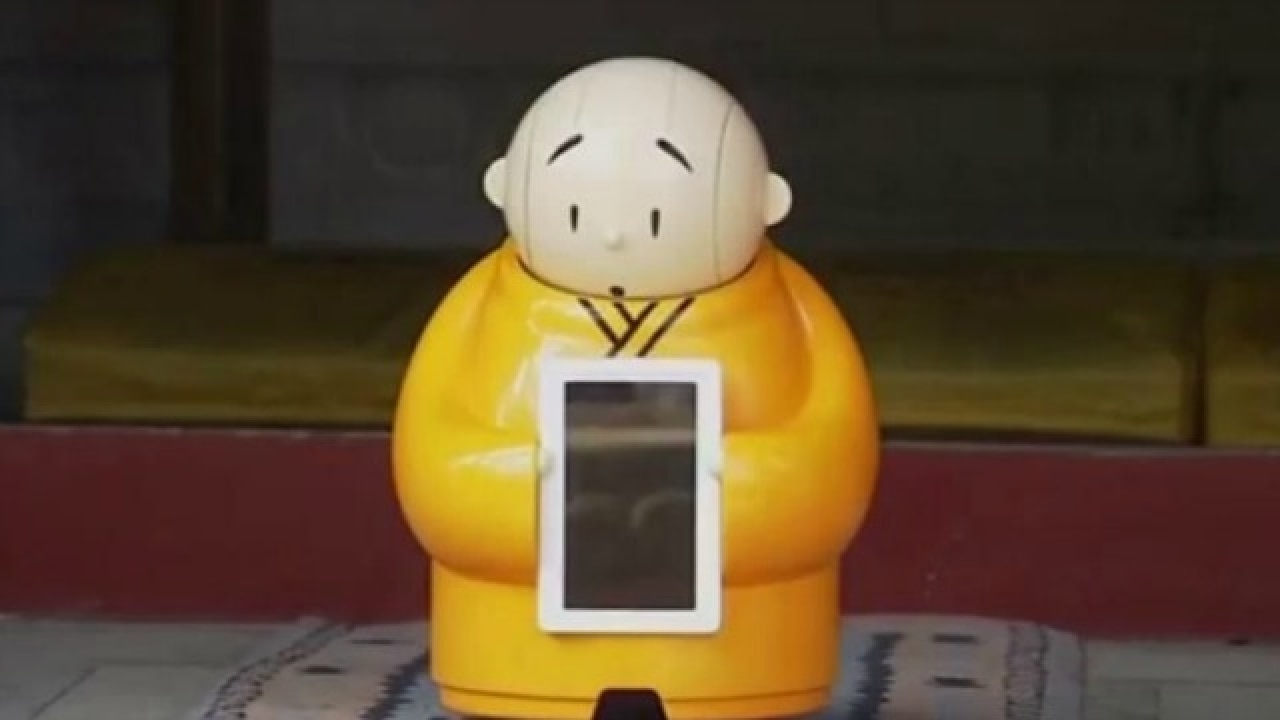 Buddhist temple has cartoon-like robot monk to engage the new generation
