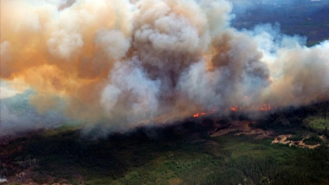 Canadian wildfire grows tenfold, forces more evacuations