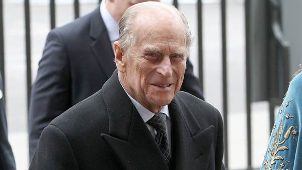 UK's Prince Philip caught on camera swearing at photographer