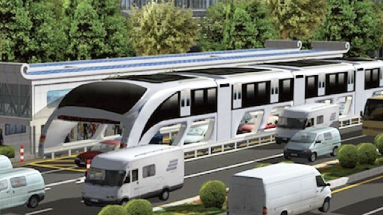 Futuristic 'straddling bus' to drive over cars in China