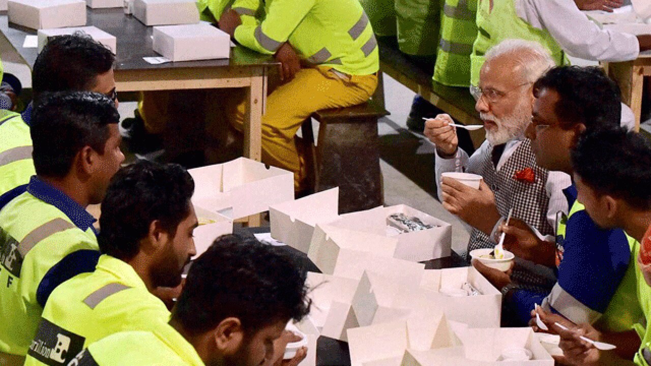 Watch | Modi in Qatar: PM meets Indian workers in Doha, shares meal ...