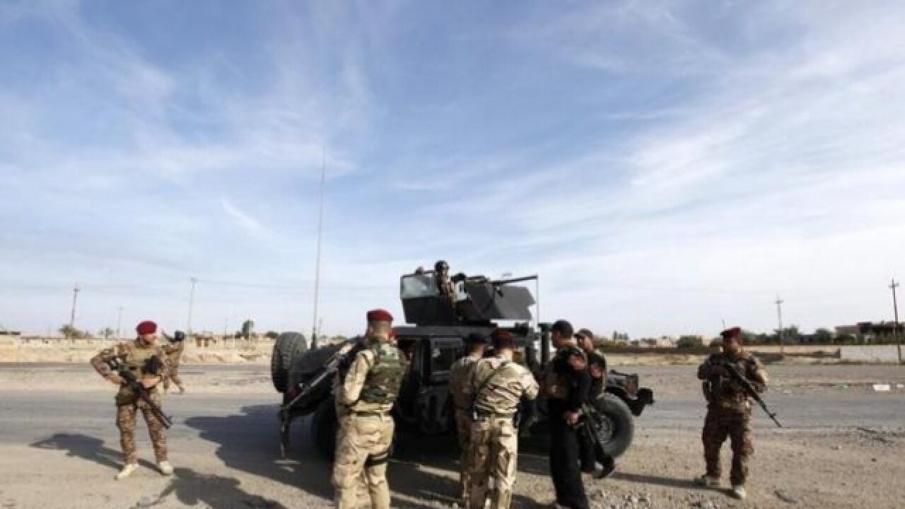 Iraqi forces take Falluja government building from Islamic State - state TV