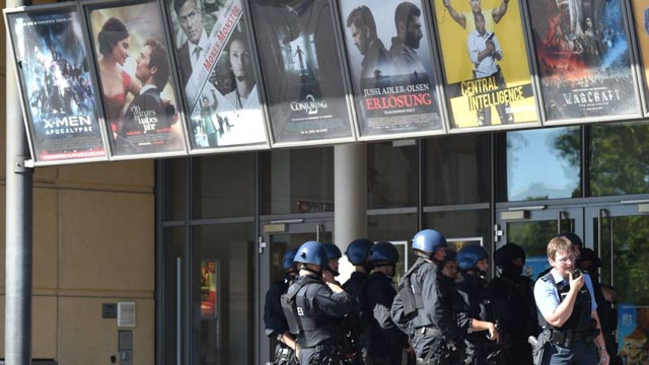 Germany shooting: Police shoot dead gunman who took hostages at cinema ...