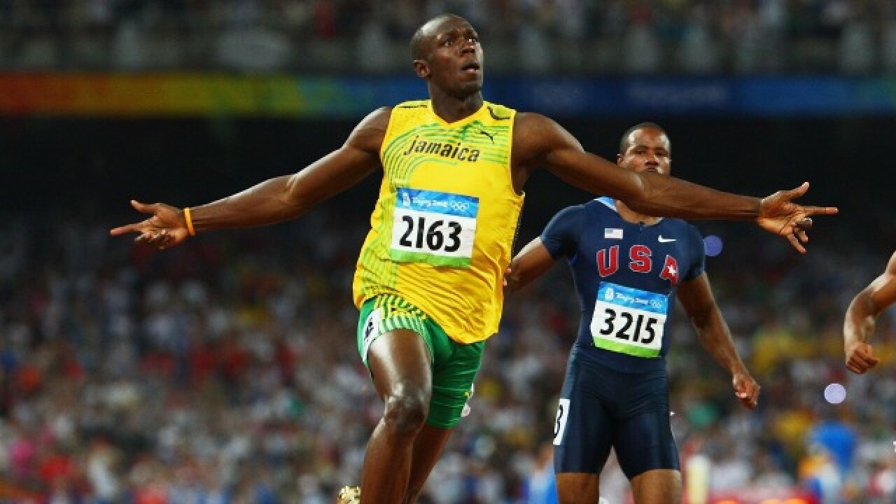 Usain Bolt keeps Rio Olympic hopes alive despite hamstring injury ...