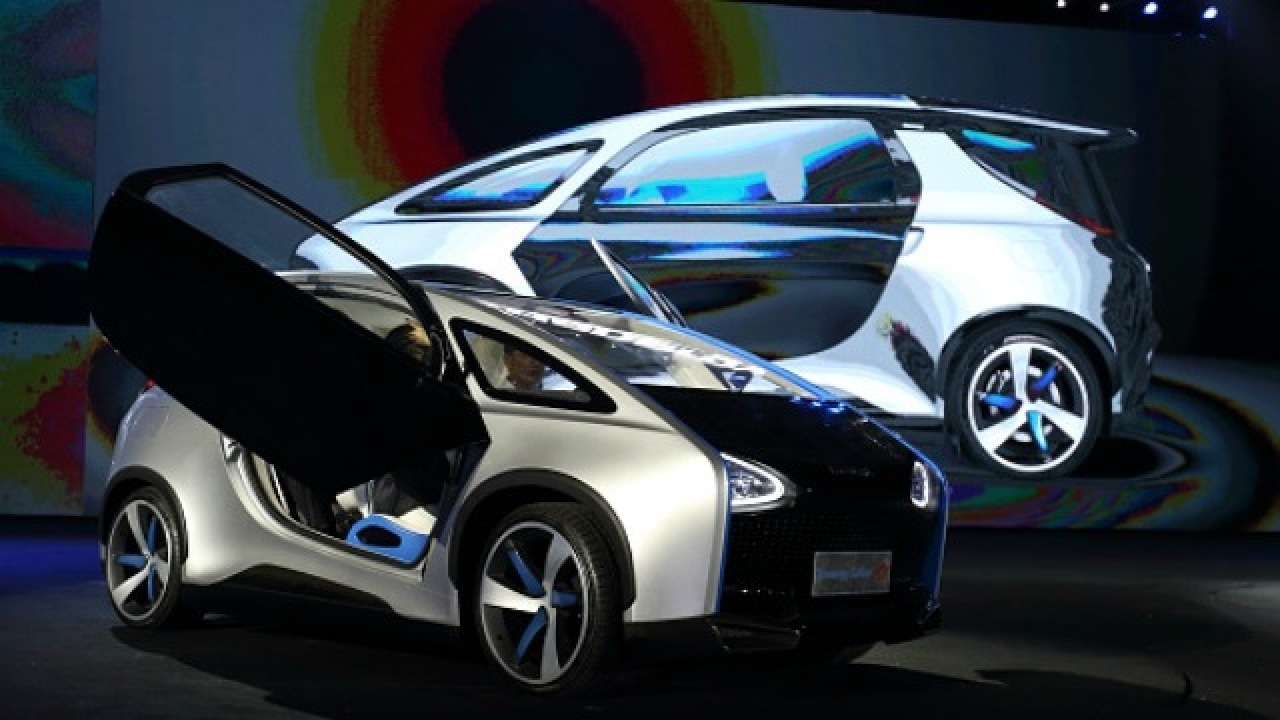 Hanergy unveils solar-powered electric cars in China