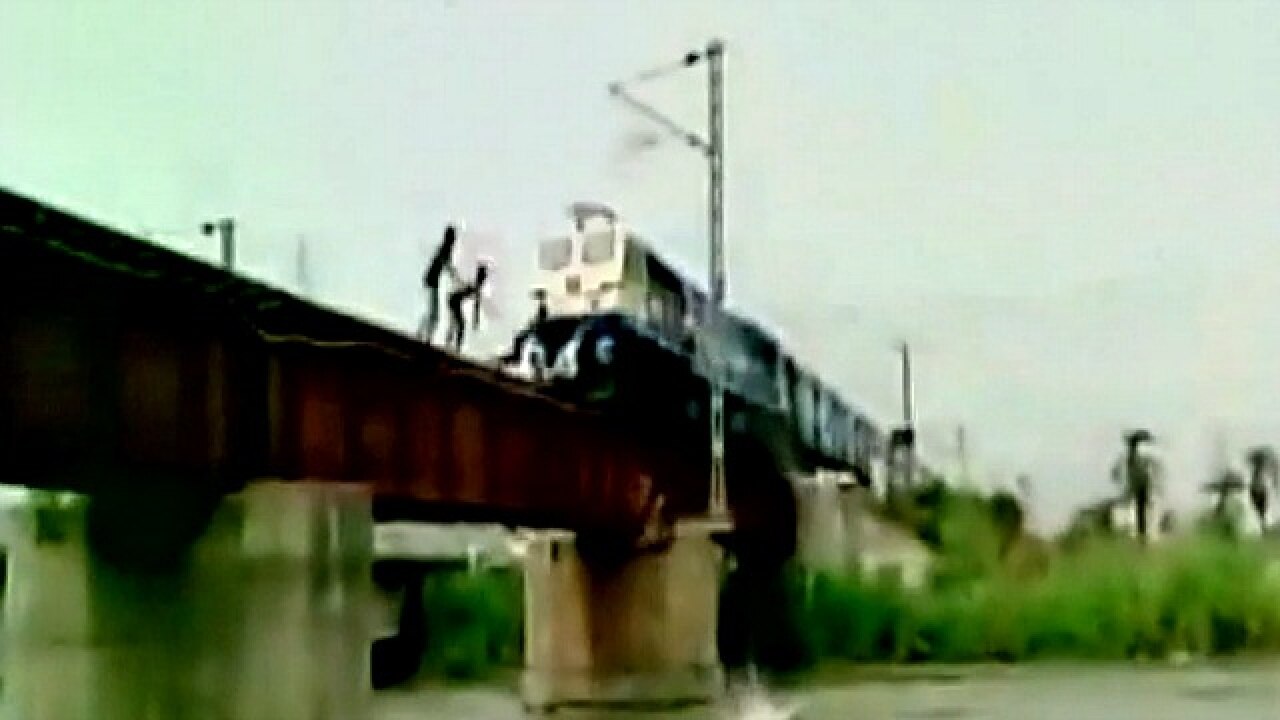 Shocking train track stunt: These boys escape death by seconds!