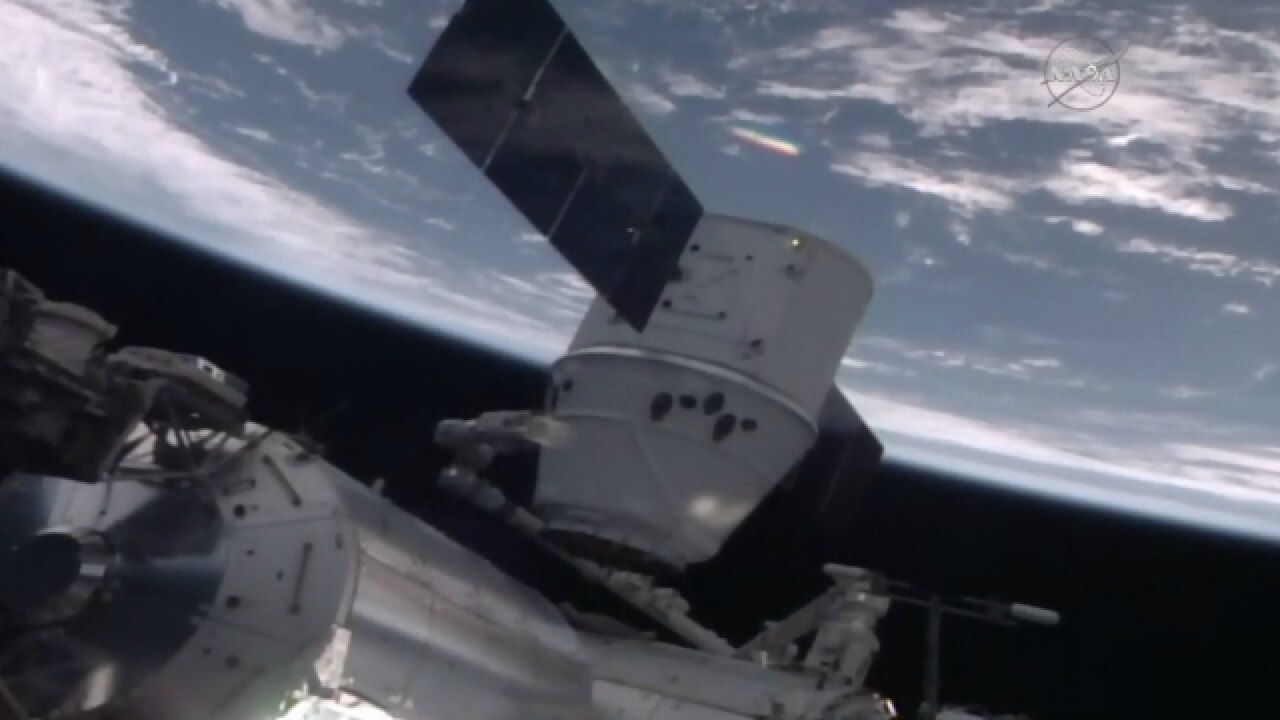 SpaceX Dragon capsule delivers new station docking port