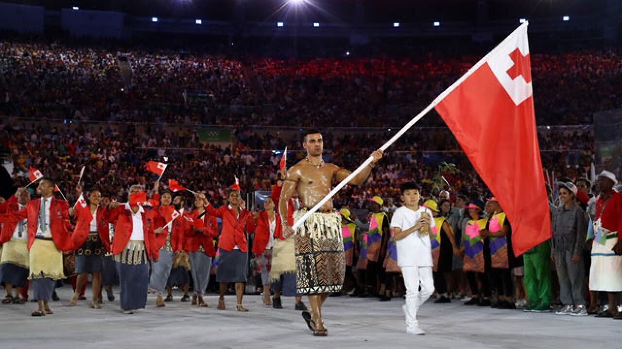 Tonga flagbearer: All you need to know about the glistening star of Rio ...