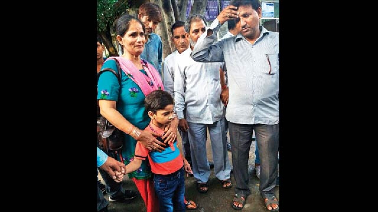 Nine years later, photo album helps parents find their kidnapped child