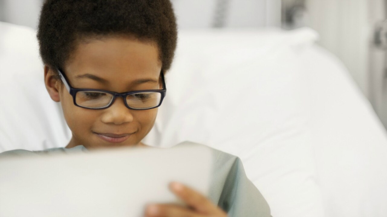 Researchers say playing on a tablet is an effective pre-surgery calming ...
