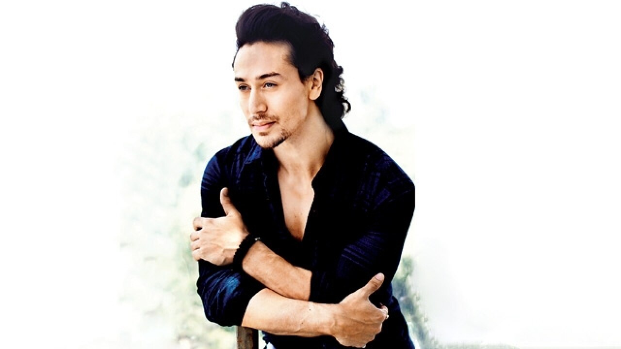 See picture: Tiger Shroff uses his super strength for 'Munna Michael'