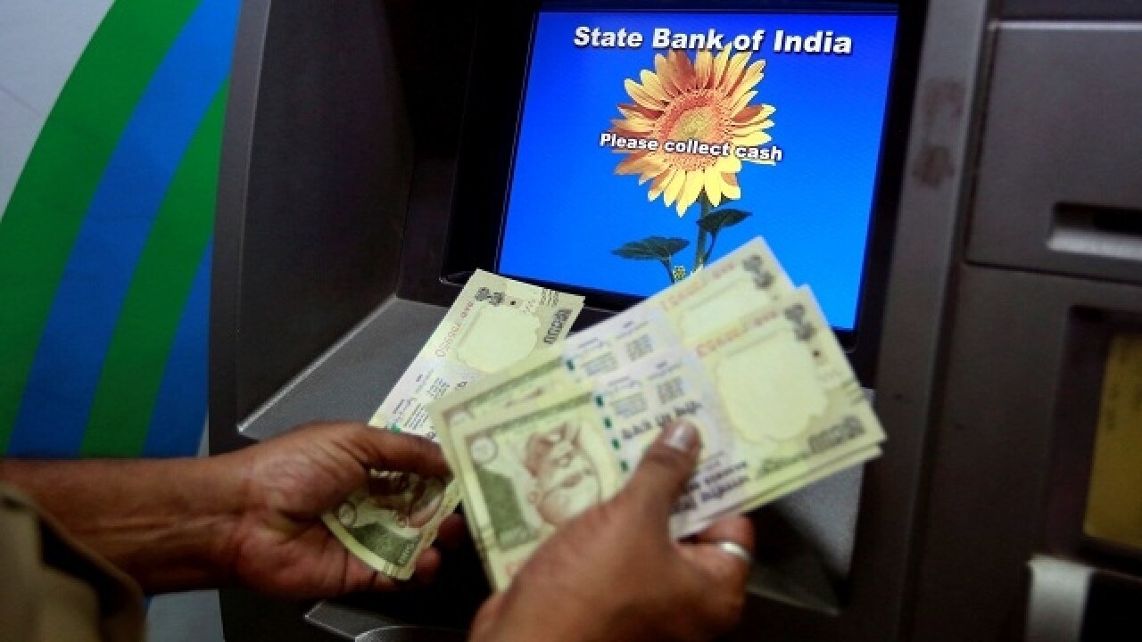 Kolkata: Clashes, chaos abound as ATMs run dry and cash in banks run out