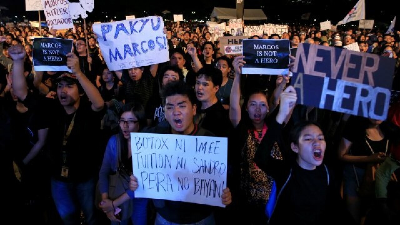 Filipinos march in Manila to protest dictator's divisive burial