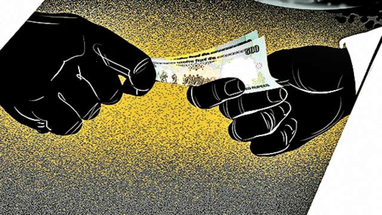 I-T man held for posing as senior, asking for bribe