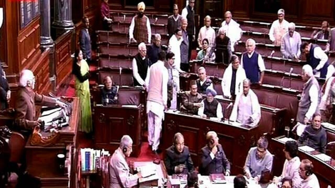Modi's 'raincoat' jibe: Difference of opinion within Congress over ...