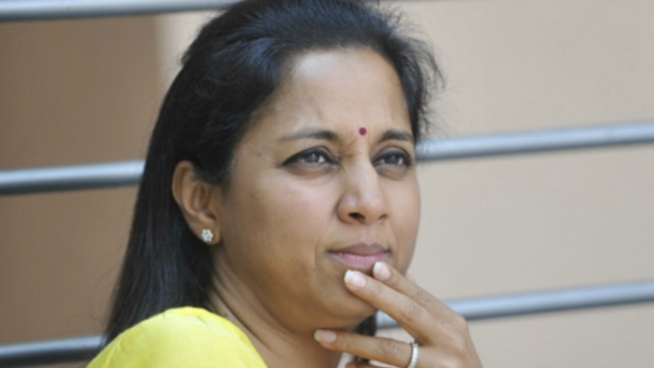 Watch: NCP MP Supriya Sule rides pillion without helmet in Mumbai