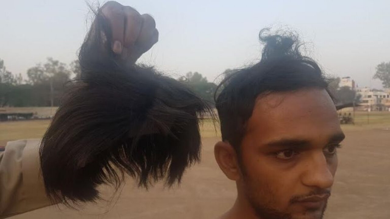 Watch: Candidate dons hair wig to meet police recruitment eligibility ...
