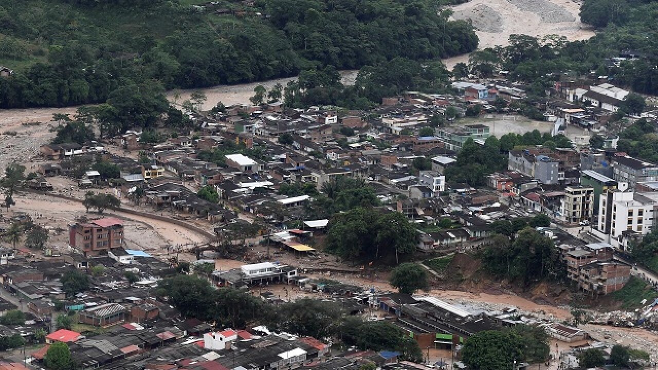 Colombia mudslides kill at least 206, sweep away homes, bridges & vehicles