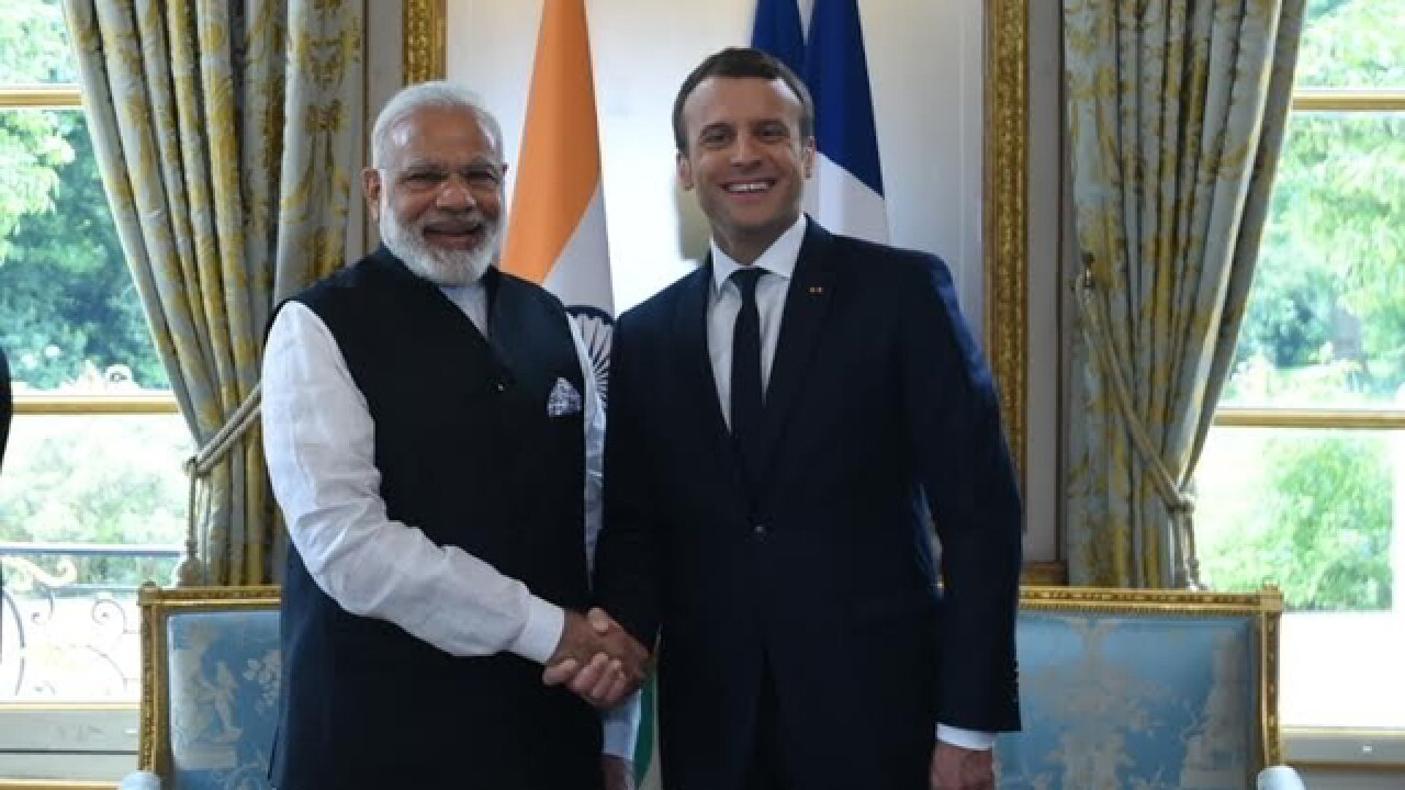 Modi in France: French President Macron thanks Indian soldiers for ...
