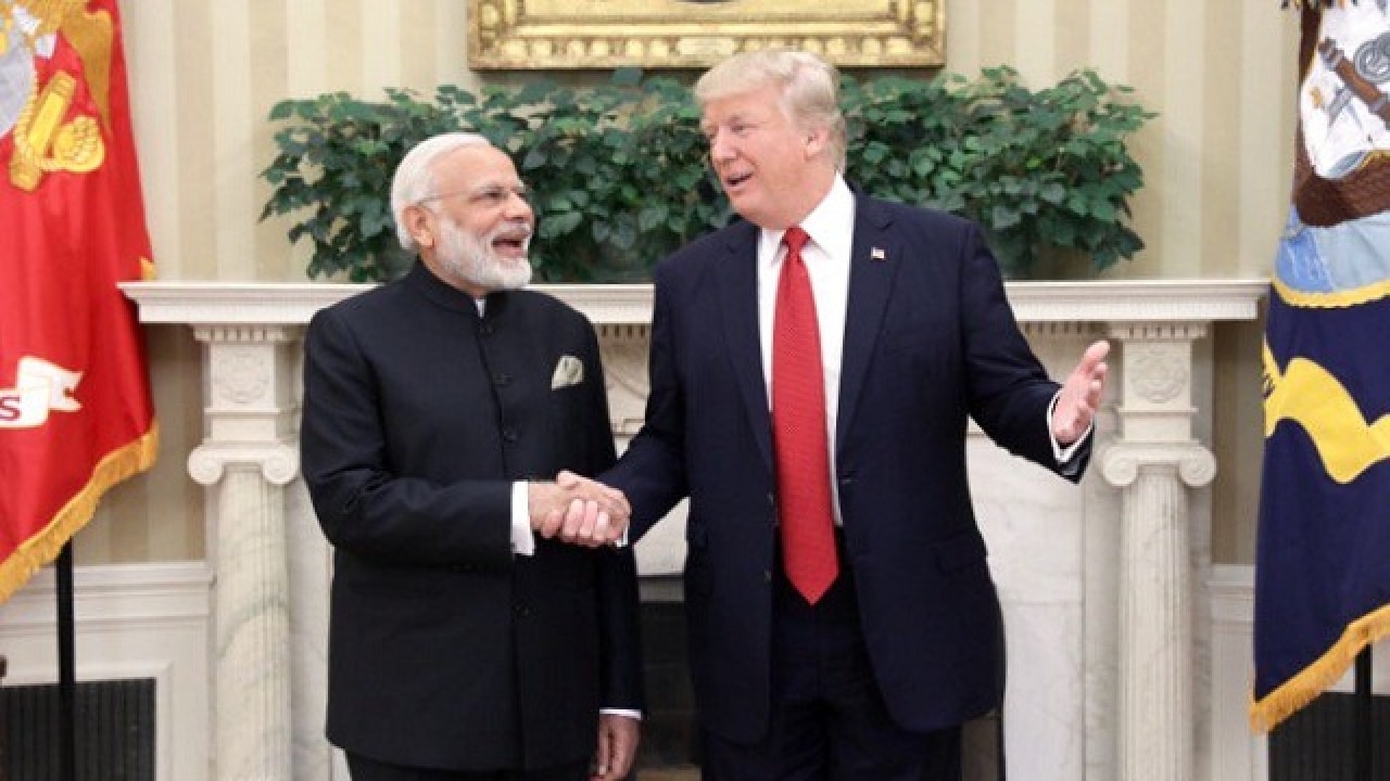 With hugs and praise, PM Modi and Prez Trump strike rapport