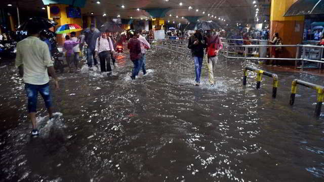 Mumbai rains: Apocalyptic rain holds city ransom, political mud ...