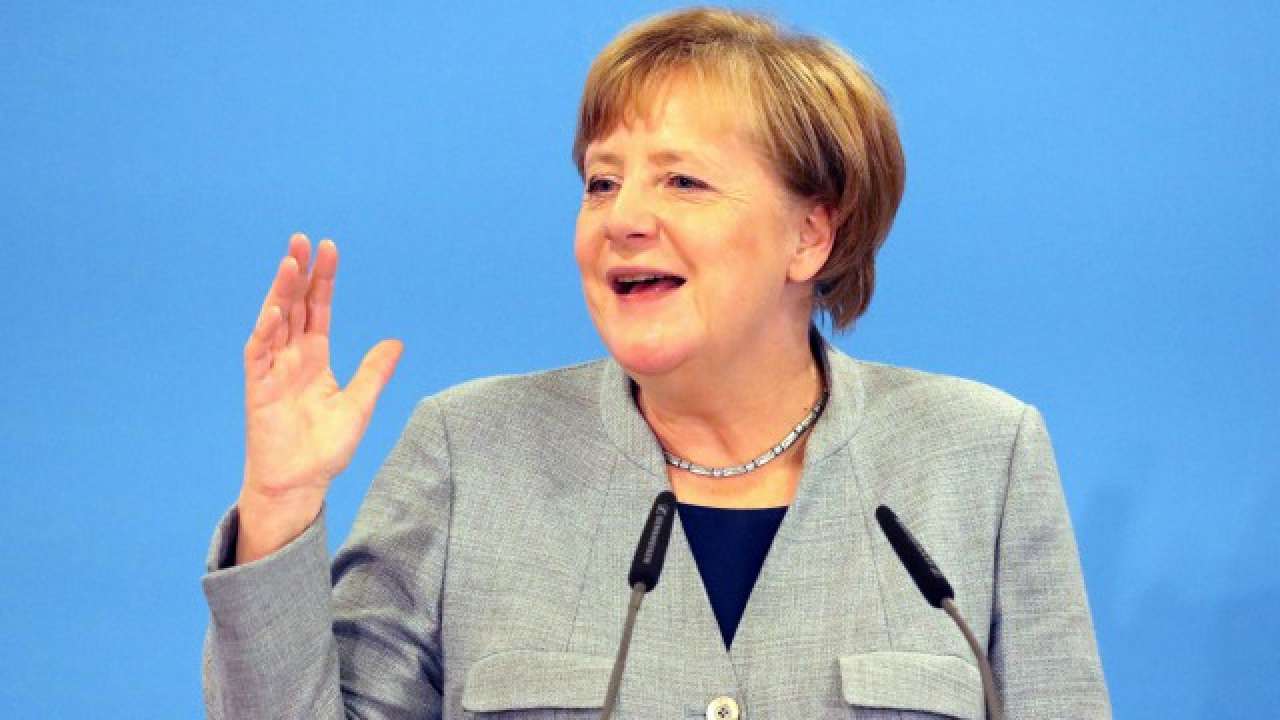 As clamour for grand alliance rises, Angela Merkel consolidates position