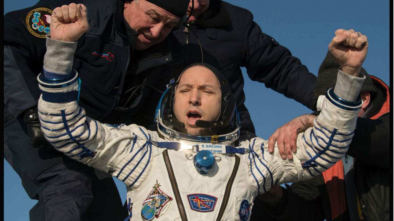 Two astronauts, cosmonaut on mission return from International Space ...