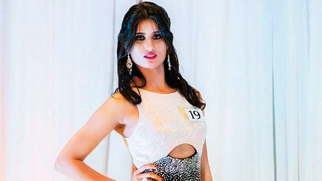 Stranded model gets passport in record time