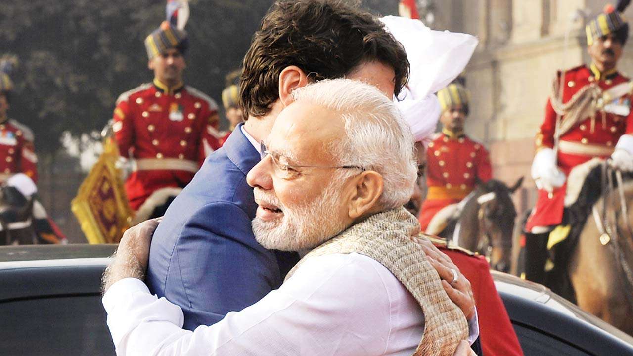 PM Modi's hug & hard talk with Justin Trudeau