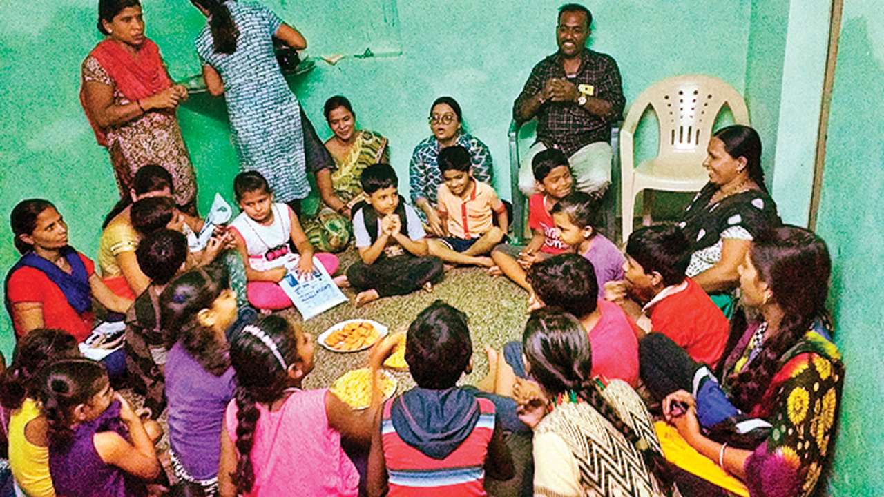 Students teach parents at sharing circle