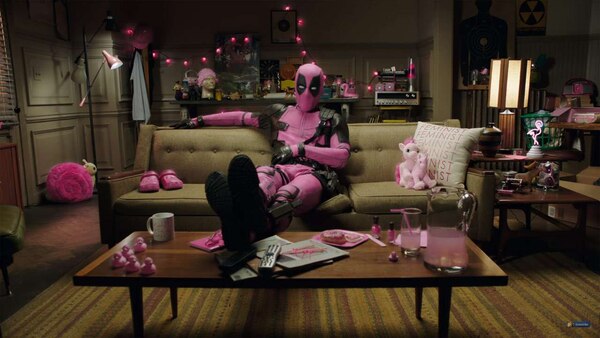 Why is Deadpool wearing a pink costume?