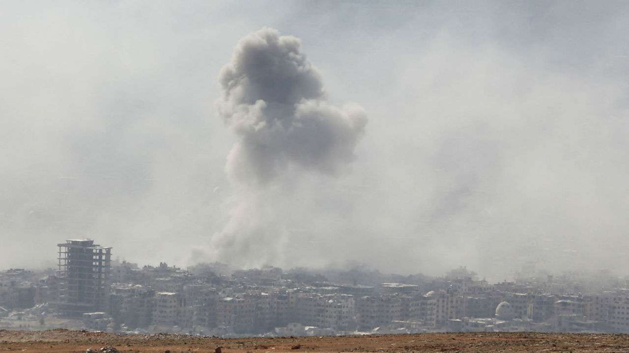 Syria Civil War: Dozens killed in suspected gas attack, but Damascus denies