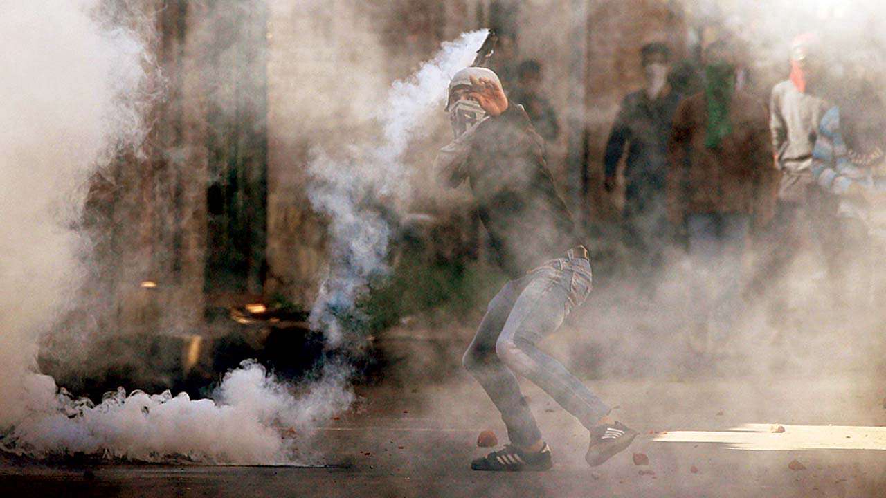 Two cops injured in grenade attack on police station