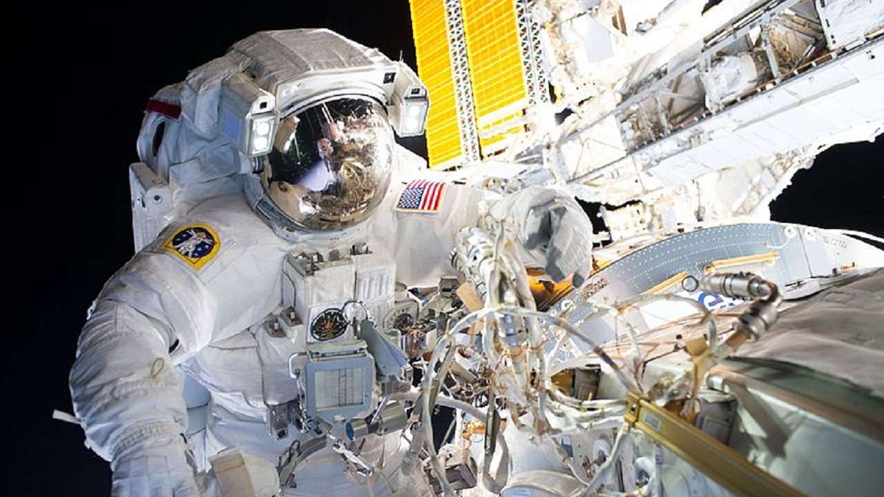 US spacewalkers swap, check coolers 'Leaky' and 'Frosty'