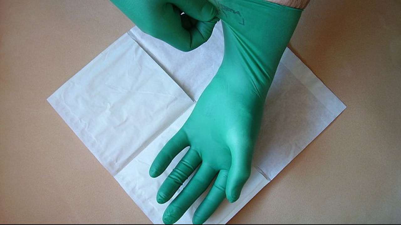 Scientists unveil the world's first antimicrobial medical gloves