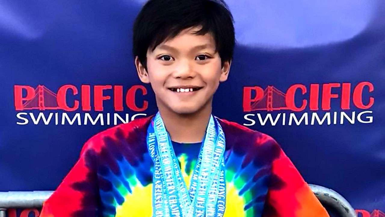 10-year-old Clark Kent beats Michael Phelps' swimming record