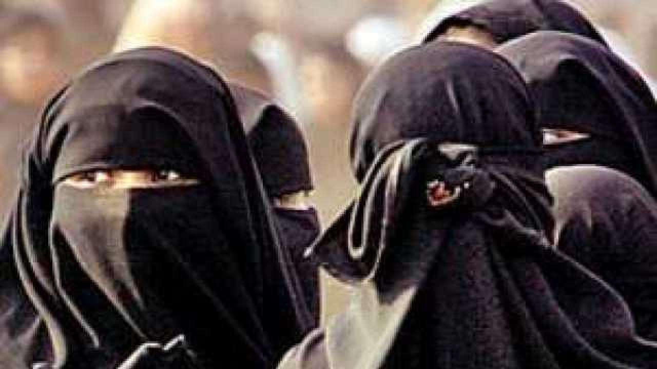 Branded as bank robbers, burqa-wearing Britons fear hate crimes
