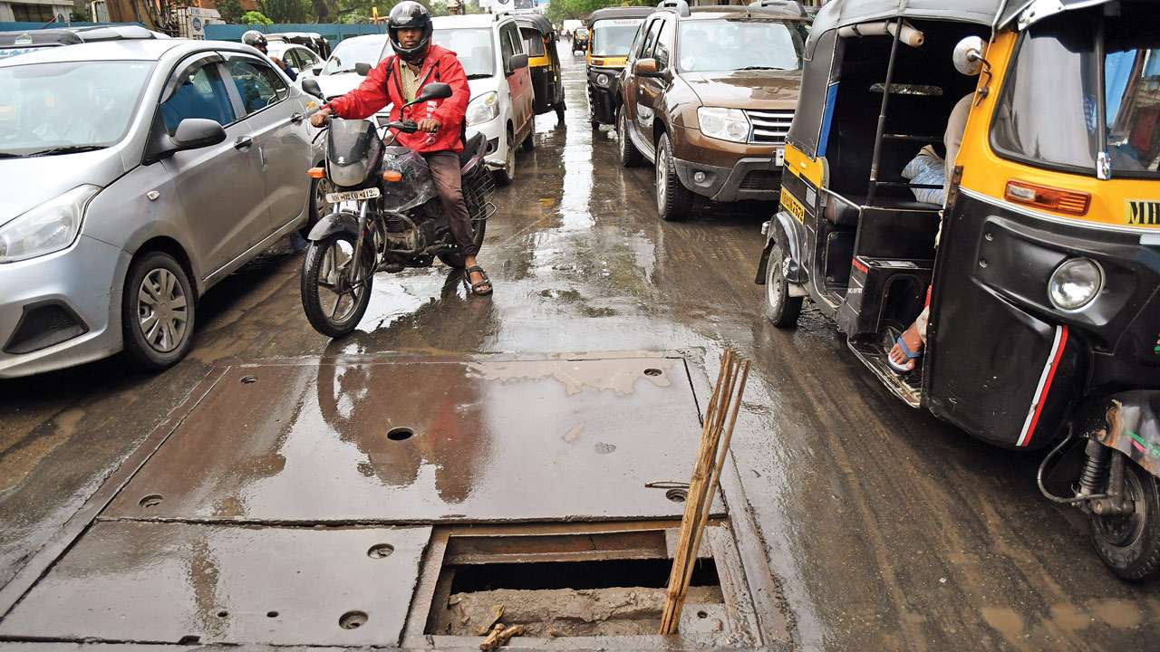 Put up red flag posts around open manholes to prevent accidents: Bombay ...