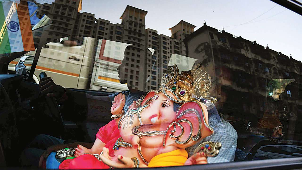 Mumbai: Even Bappa is not spared of potholes