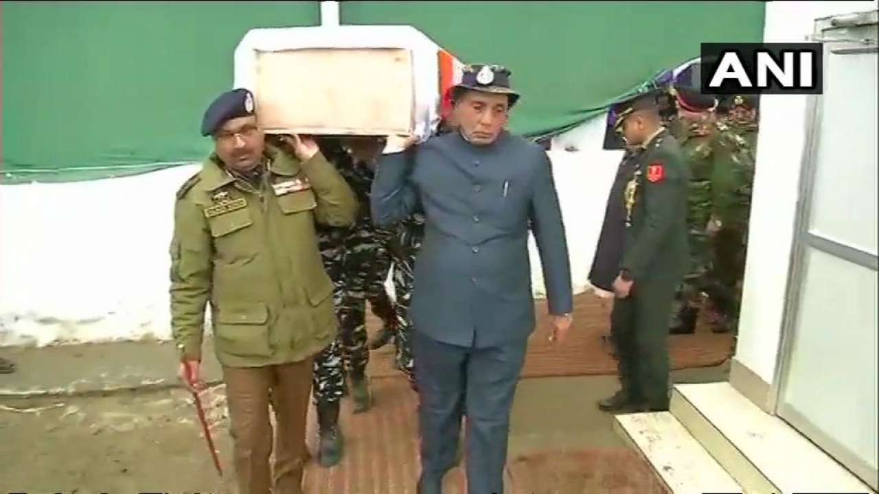 Pulwama Attack: Rajnath Singh helps carry coffin of slain CRPF jawan Pulwama Attack: Rajnath Singh helps carry coffin of slain CRPF jawan