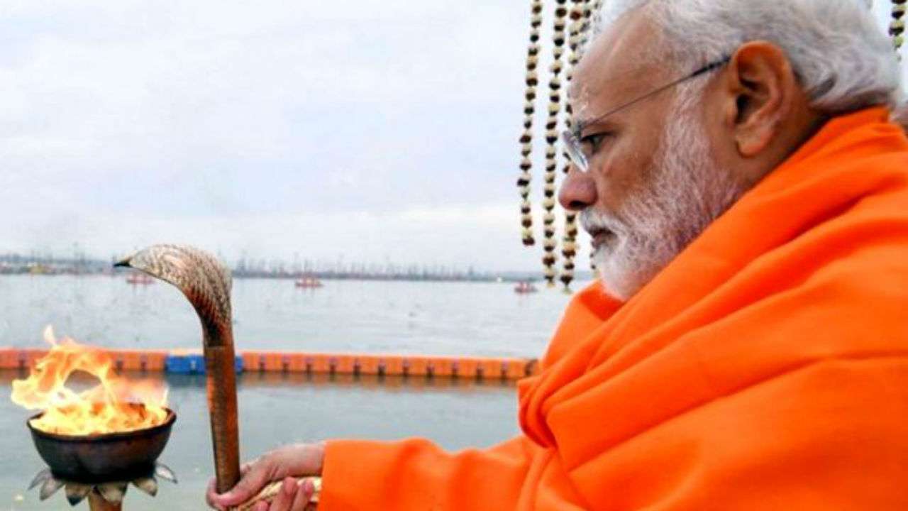 PM in Kumbh: Modi takes holy dip, washes feet of sanitation workers